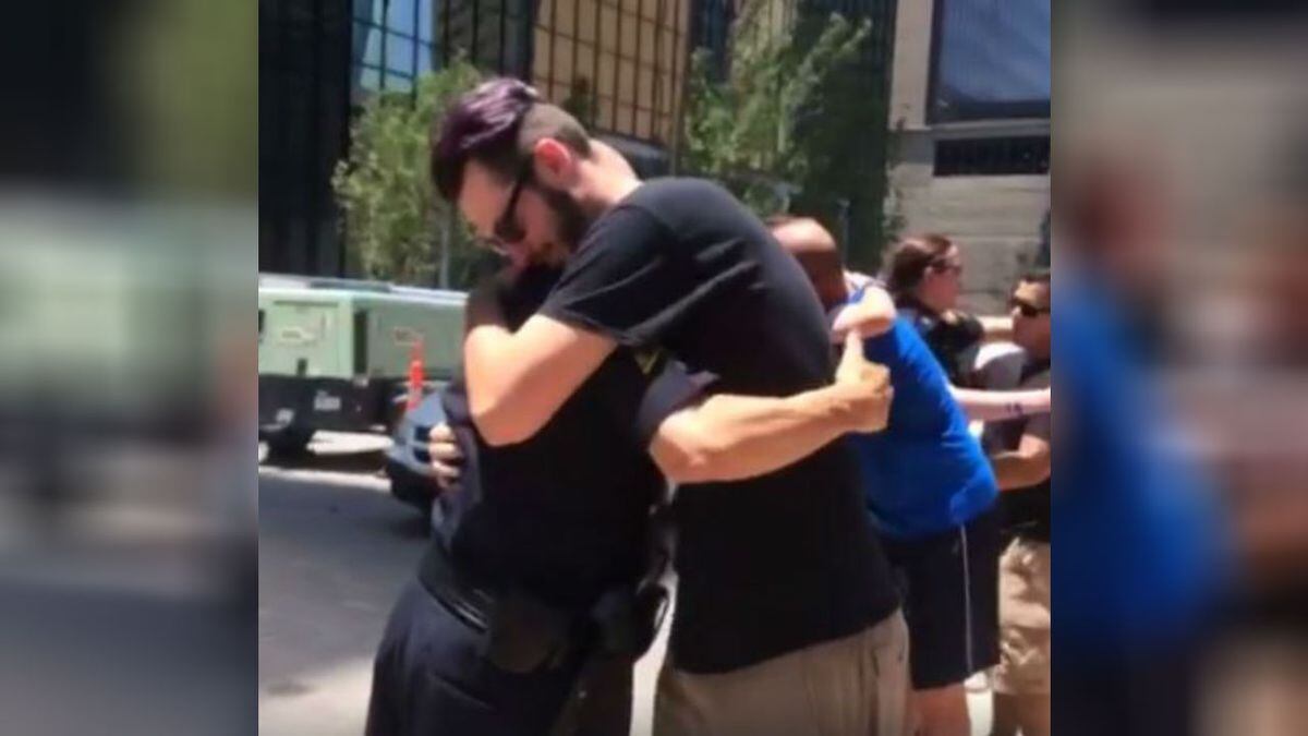 Crowds line up to hug police officers in Dallas