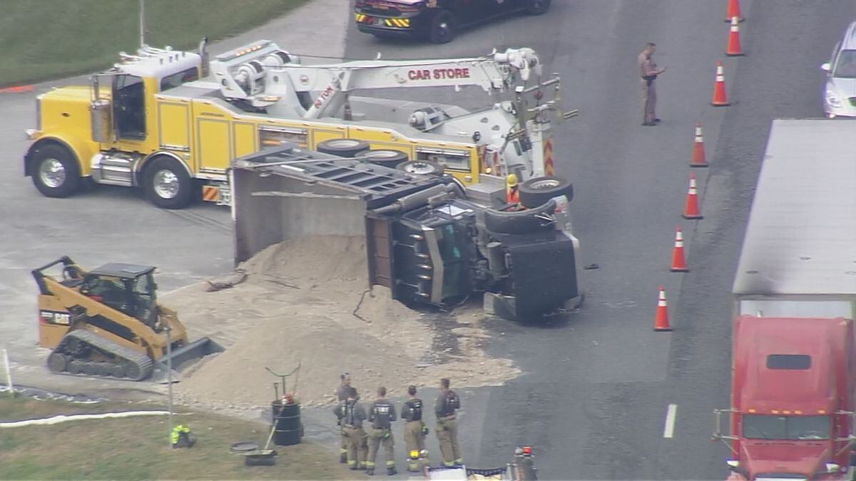 TRAFFIC ALERT: Overturned dump truck spills fuel, shuts down southbound ...